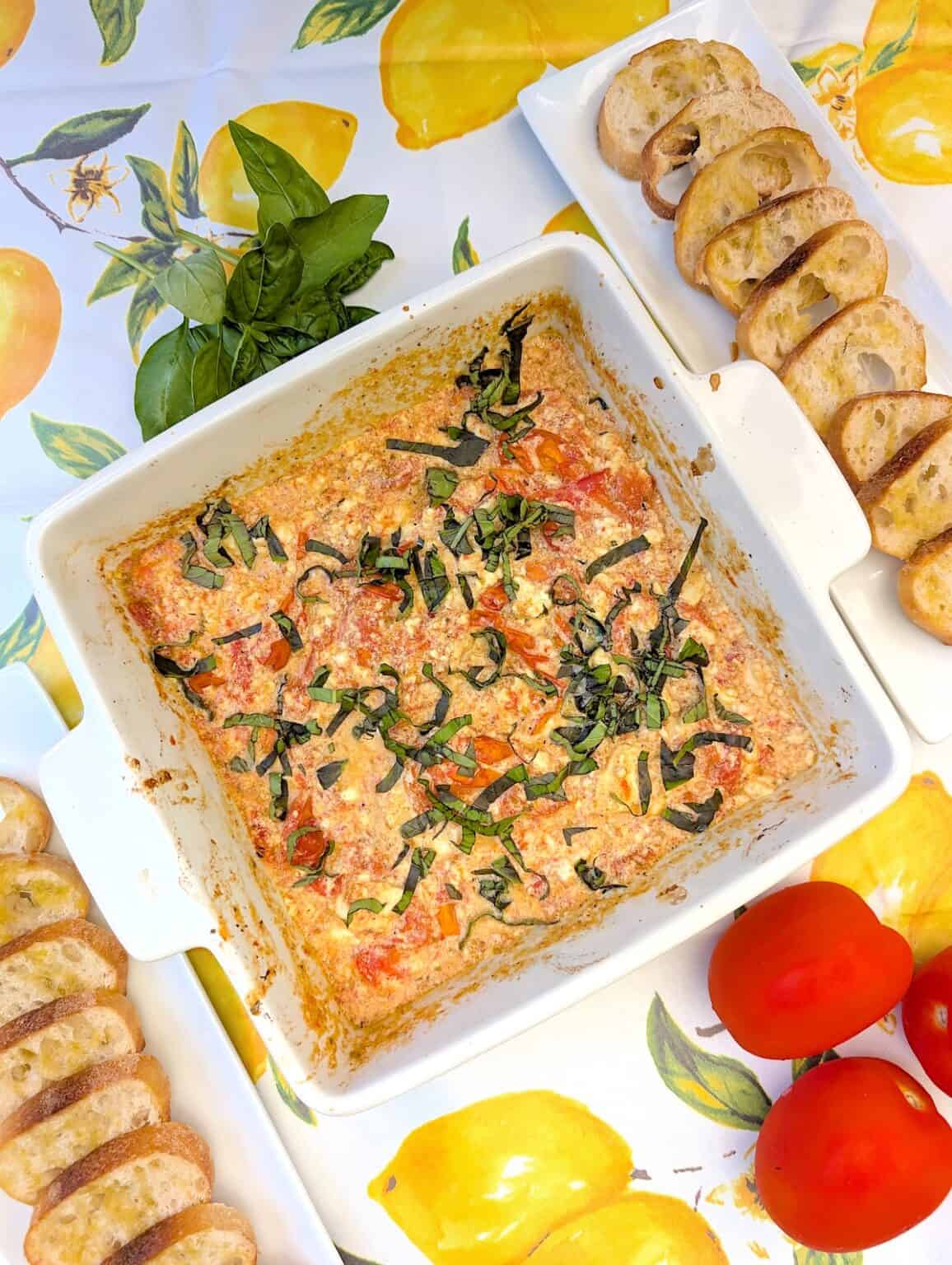 The Easiest Baked Feta Dip with Tomatoes and Basil Recipe - Foods & Friends